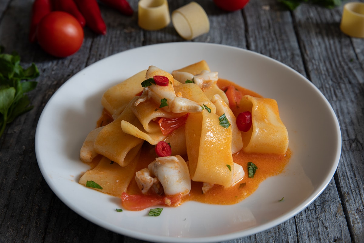 Calamarata Pasta (Squid and Tomato Sauce) Recipe - An Italian in my Kitchen